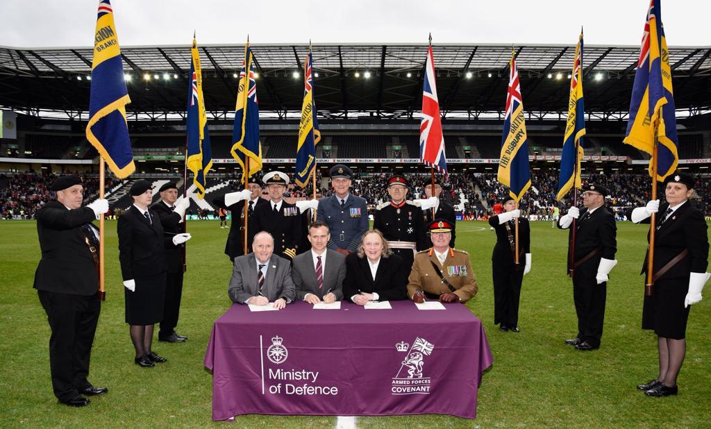 Mark Lancaster MP signs Armed Forces Covenant at MK Dons - CitiBlog